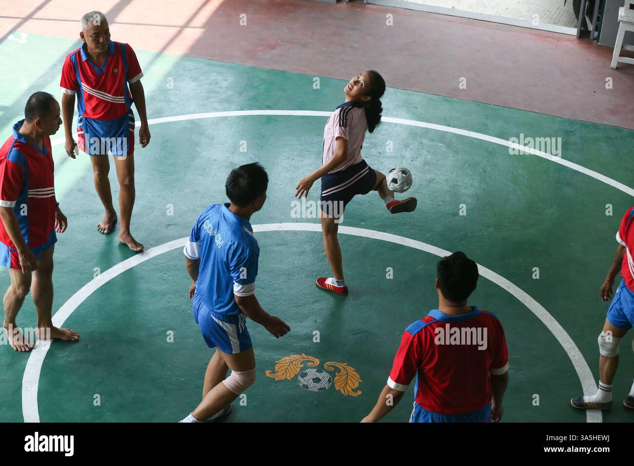 Yangon, Myanmar. 22nd Mar, 2025. People play Chinlone (caneball) at an ...