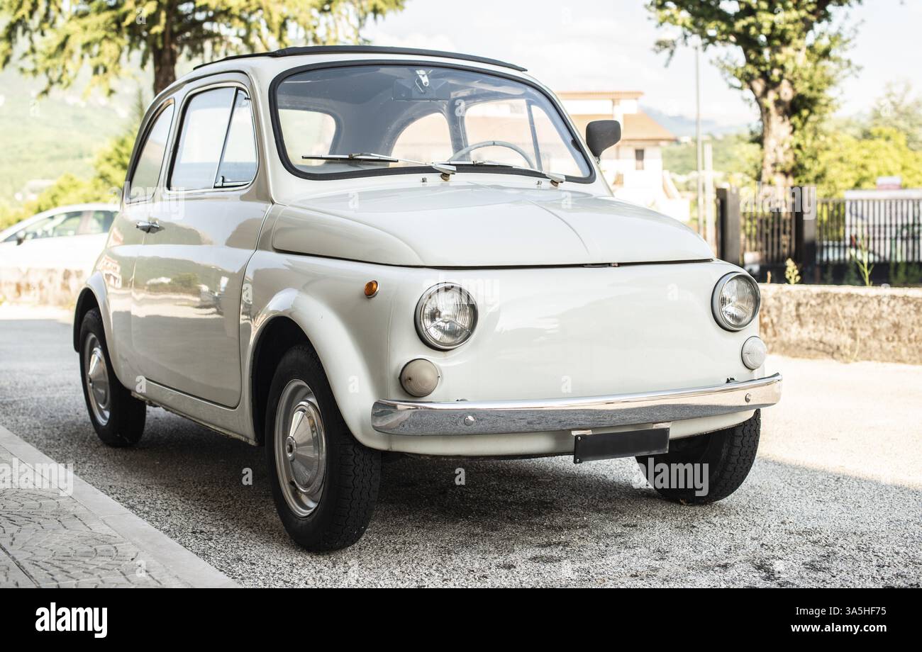 Small italian vintage car. White car Stock Photo - Alamy