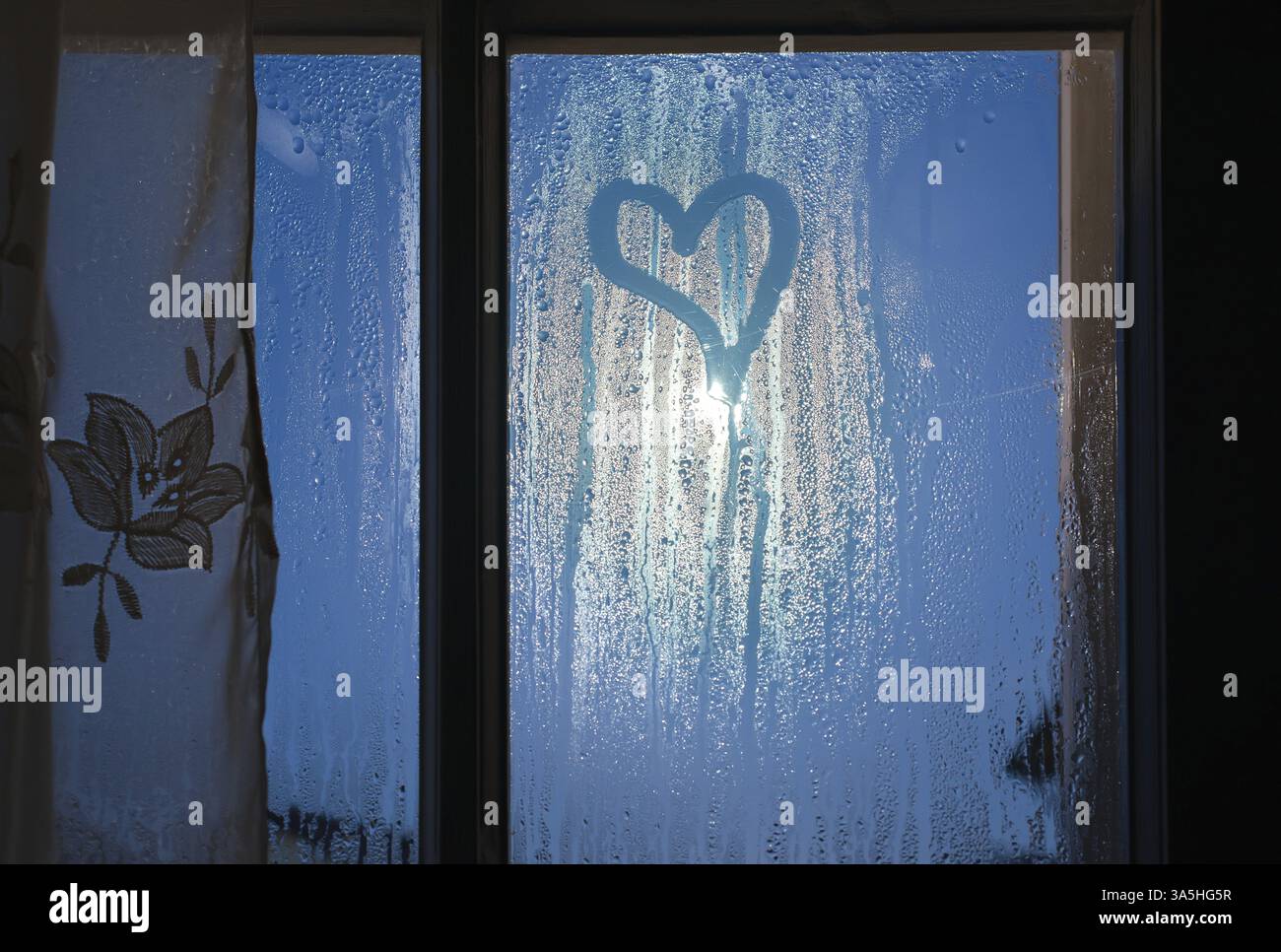 Moonlight through the window. Sweaty glass and heart shape Stock Photo ...