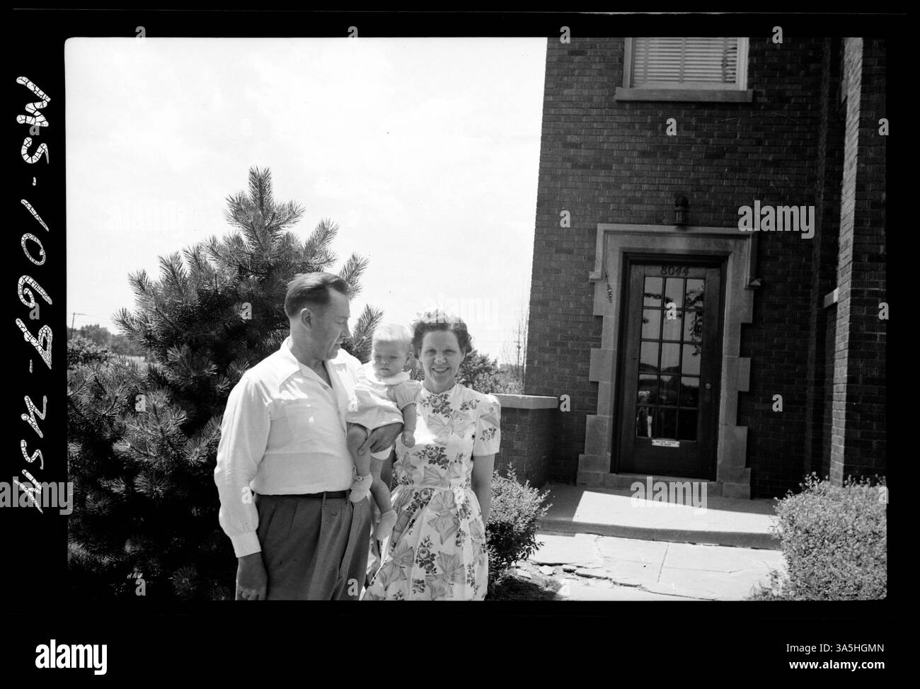 A photograph of a family from the 1940s, possibly miners, living in a ...