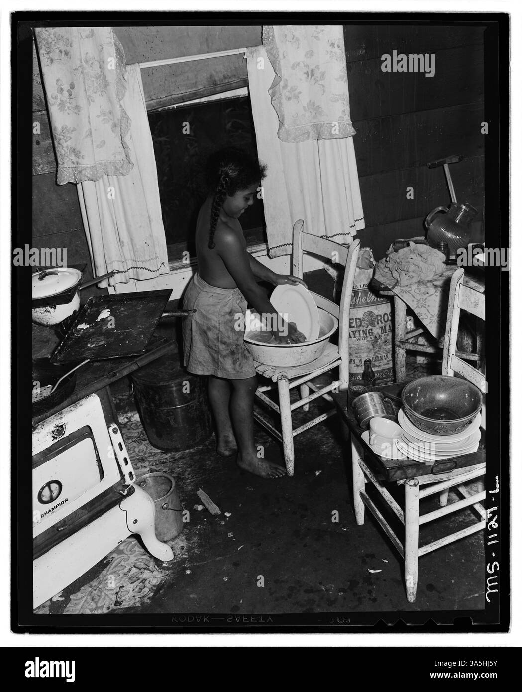 The kitchen in a home provided by the Pando Coal Company for a miner living in company housing ...