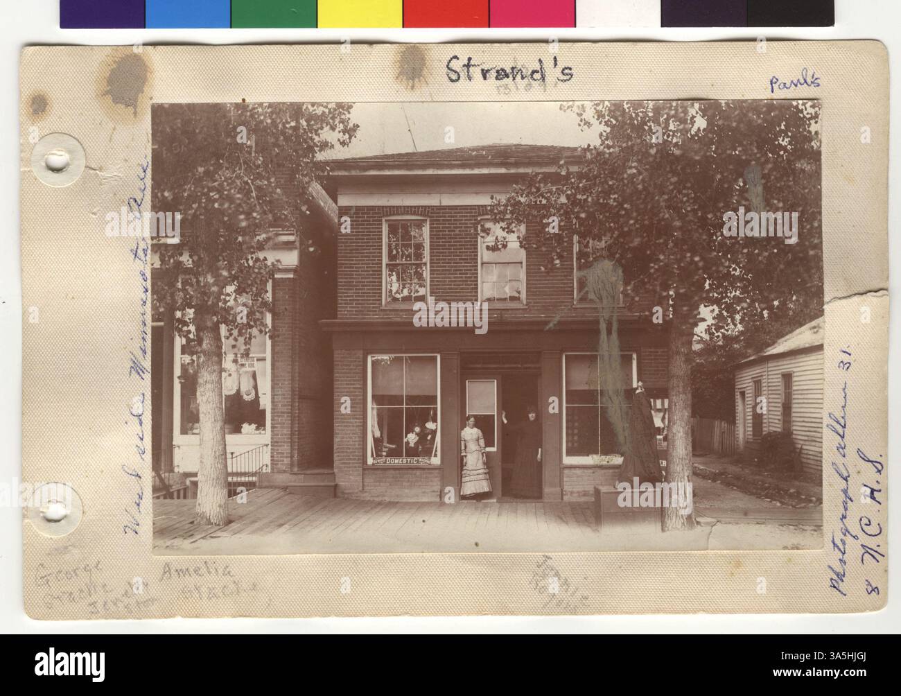 This photograph shows S. O. Strand's millinery shop located on the west ...