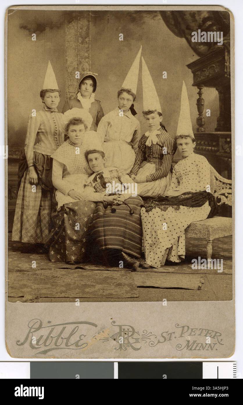 This photograph shows young women from St. Peter in costumes, with ...