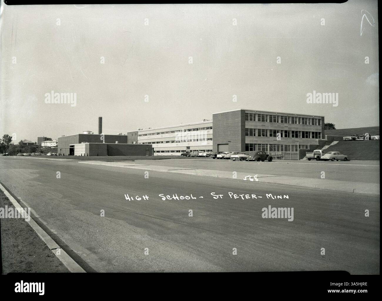 This image shows the east and north sides of St. Peter High School in ...