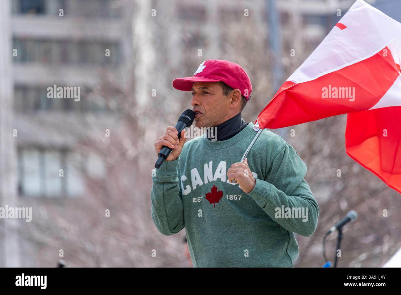 Shaun Majumder speaking at the Elbows up Rally at Toronto City Hall's ...