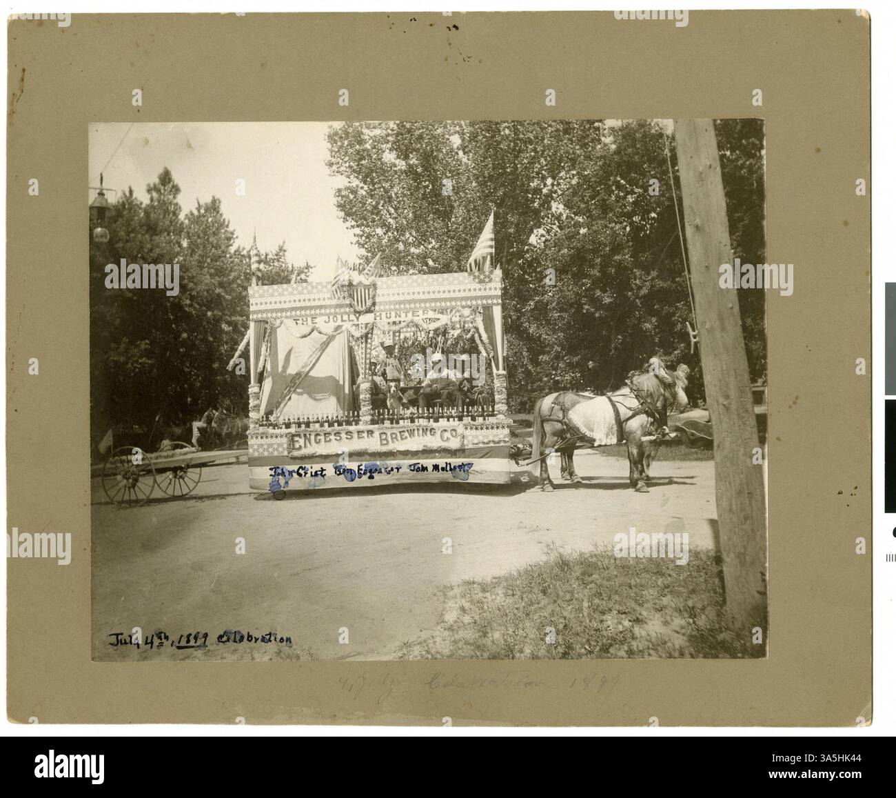 This photo shows the Engesser Brewery's horse-drawn float for the ...
