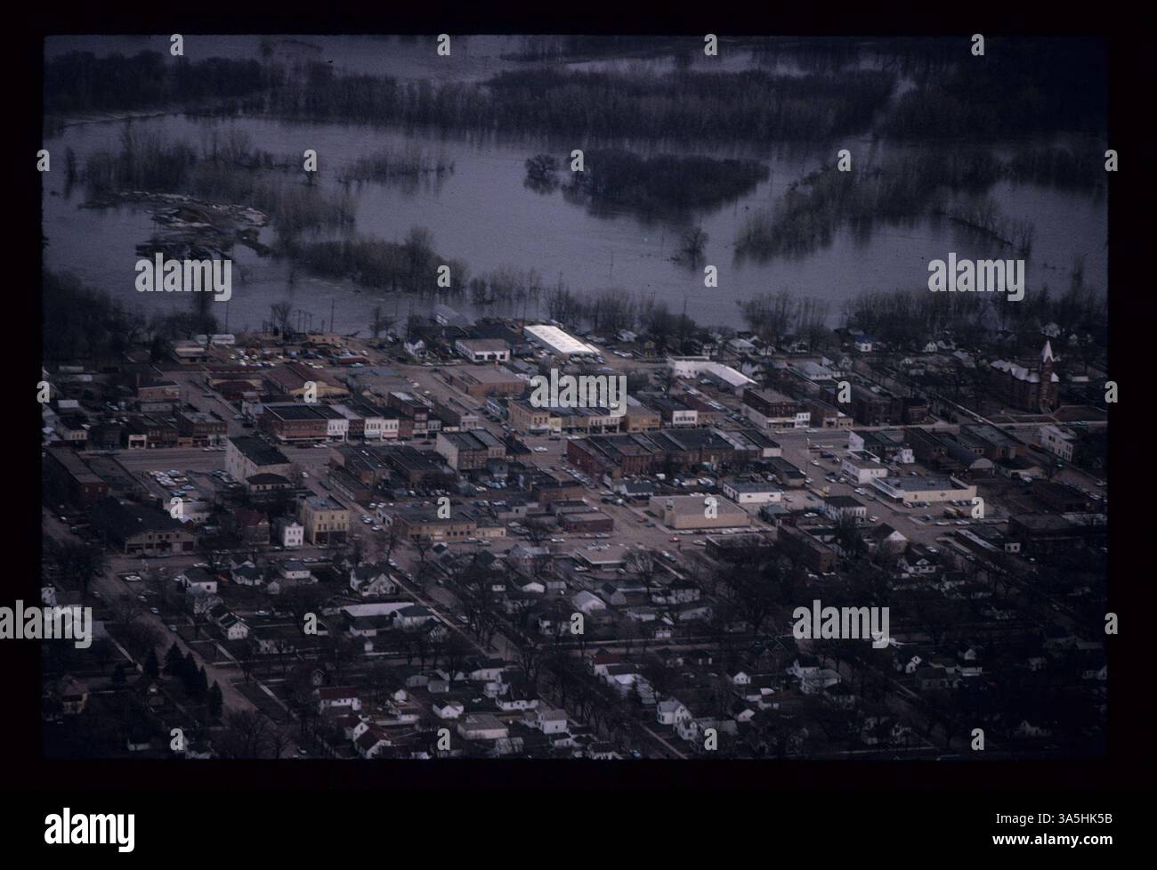 This 1965 aerial photograph shows St. Peter during the flood of the ...