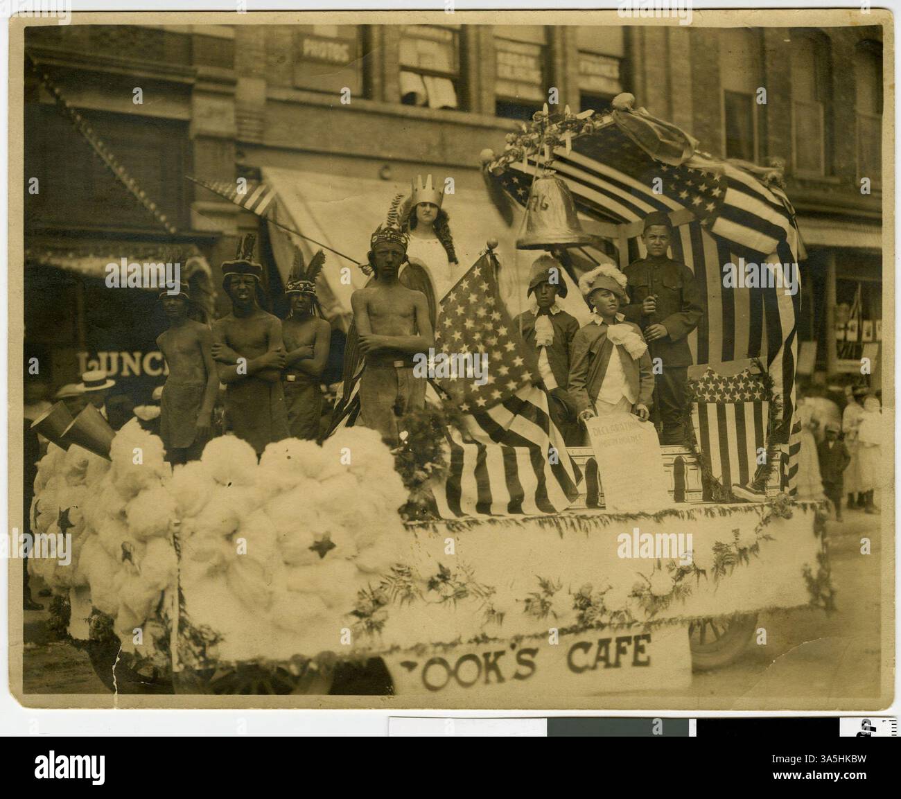 This parade float from a 1920 St. Peter event shows several ...