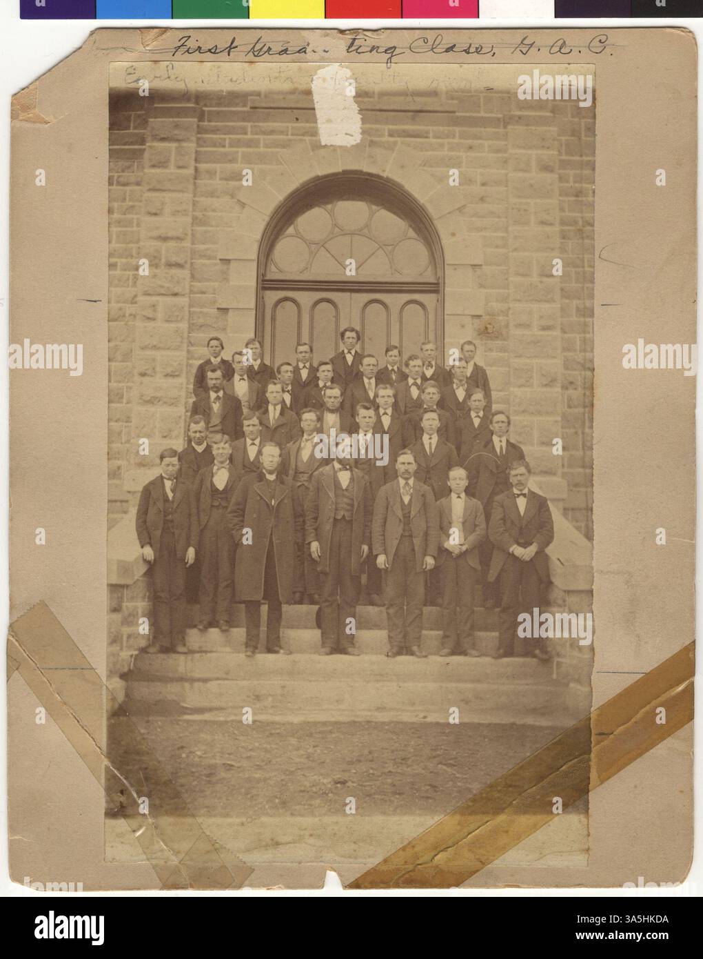 This photograph from 1877 shows teachers and students on the steps of ...