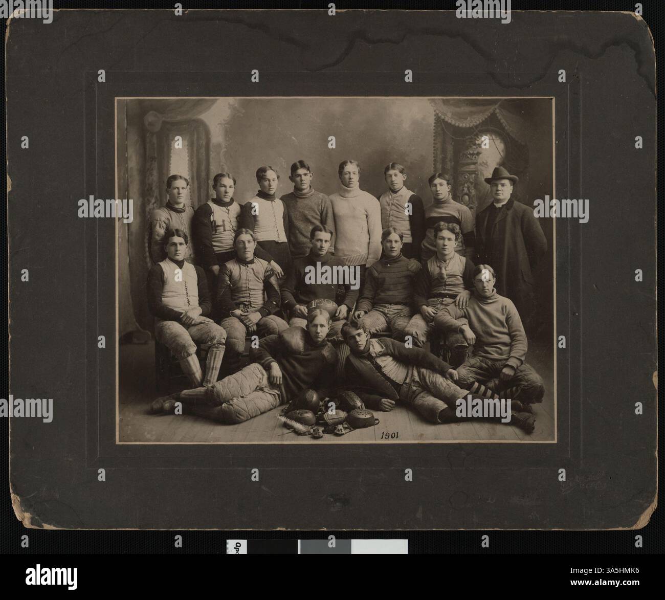 This group portrait shows members of the St. Peter football team from ...