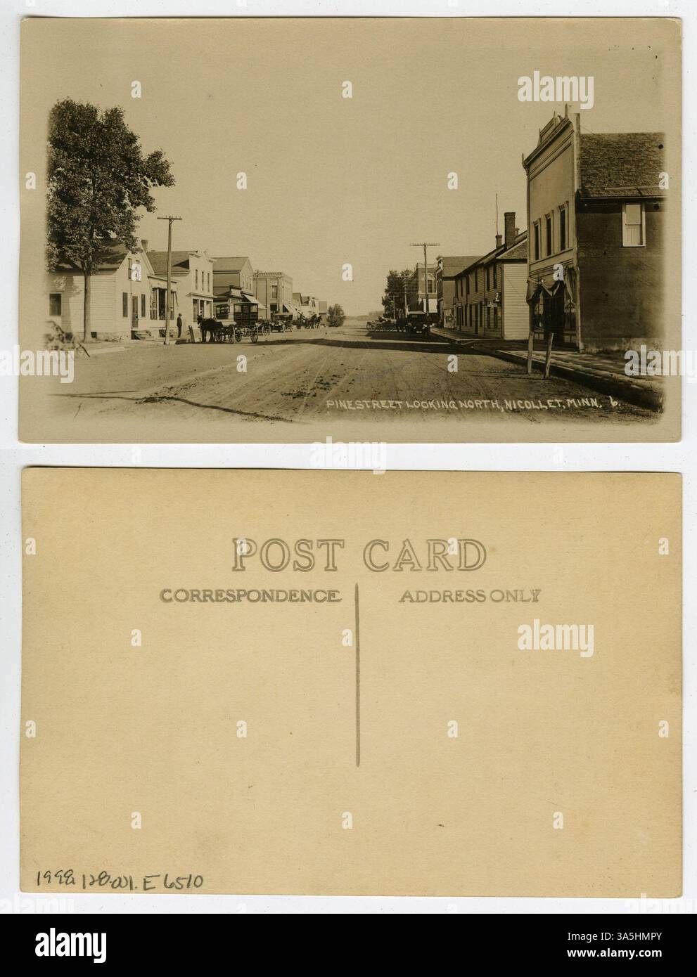 This postcard view shows the buildings along Pine Street in Nicollet ...