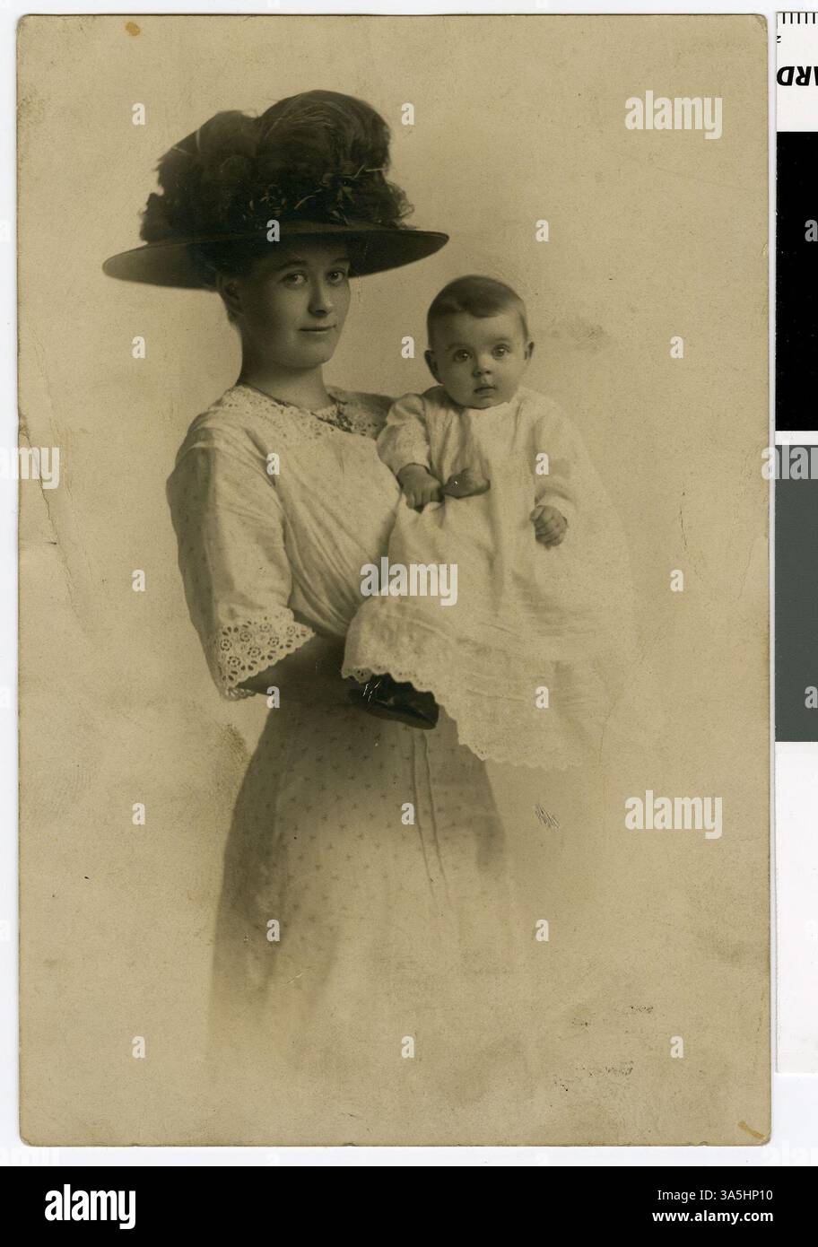A portrait of Emma Lindberg, wearing a hat and holding her daughter ...