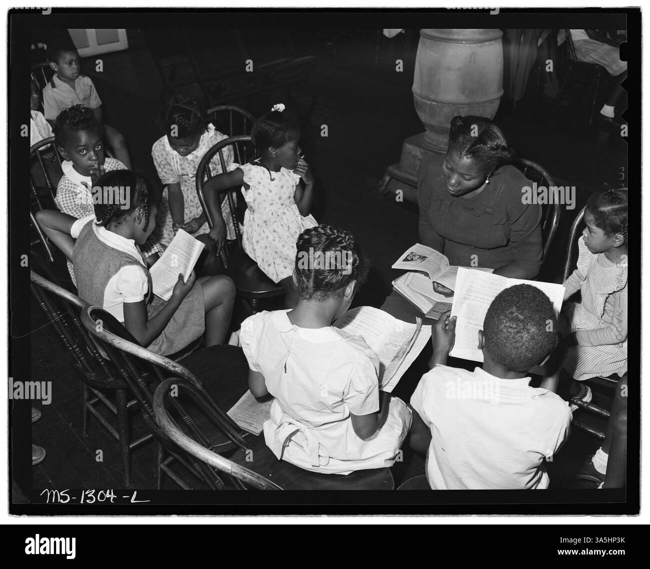 This image shows a Sunday school held for children of coal miners in ...
