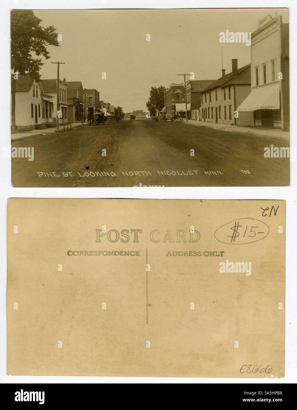 This postcard shows a view of the business district in Nicollet ...