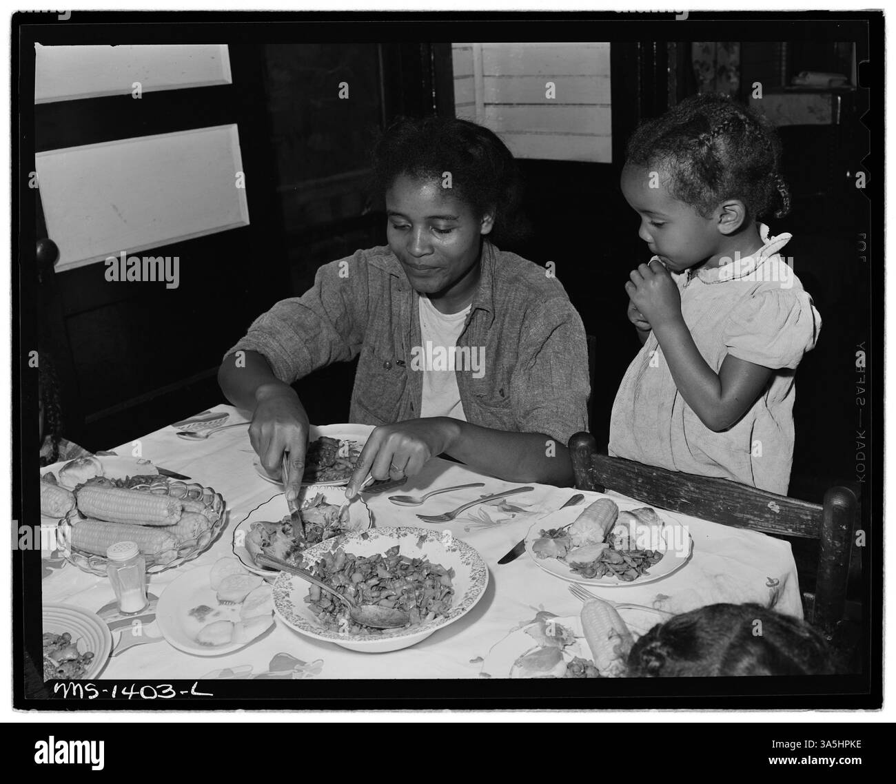 The image shows Mrs. James Robert Howard and her daughter enjoying ...