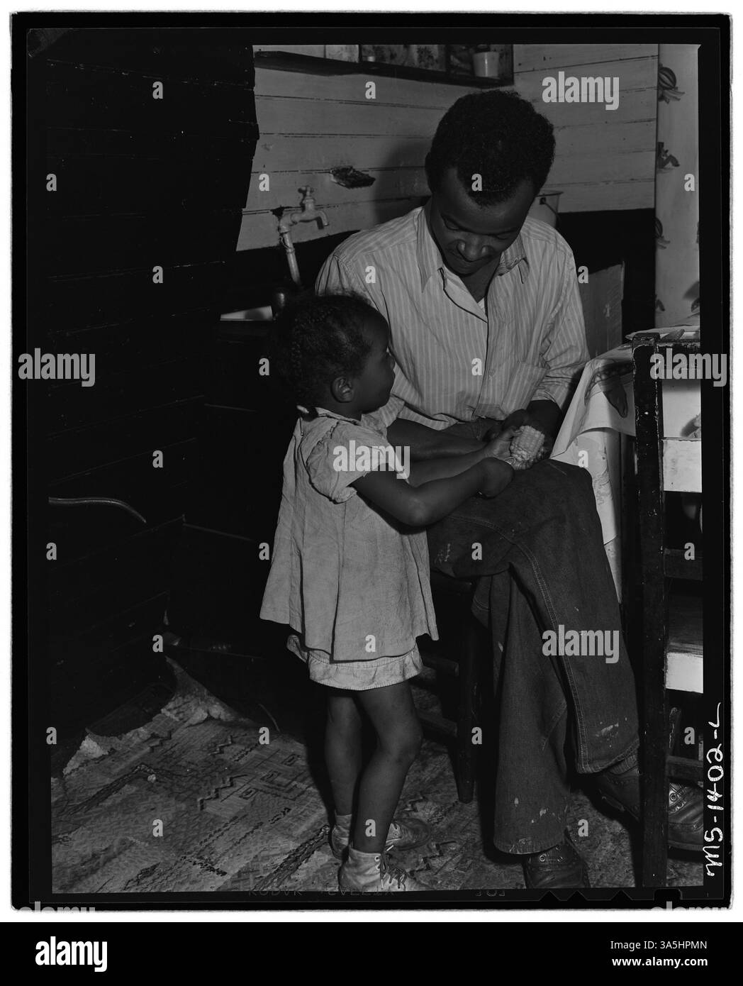 James Robert Howard and his daughter are shown in this 1946 photograph ...