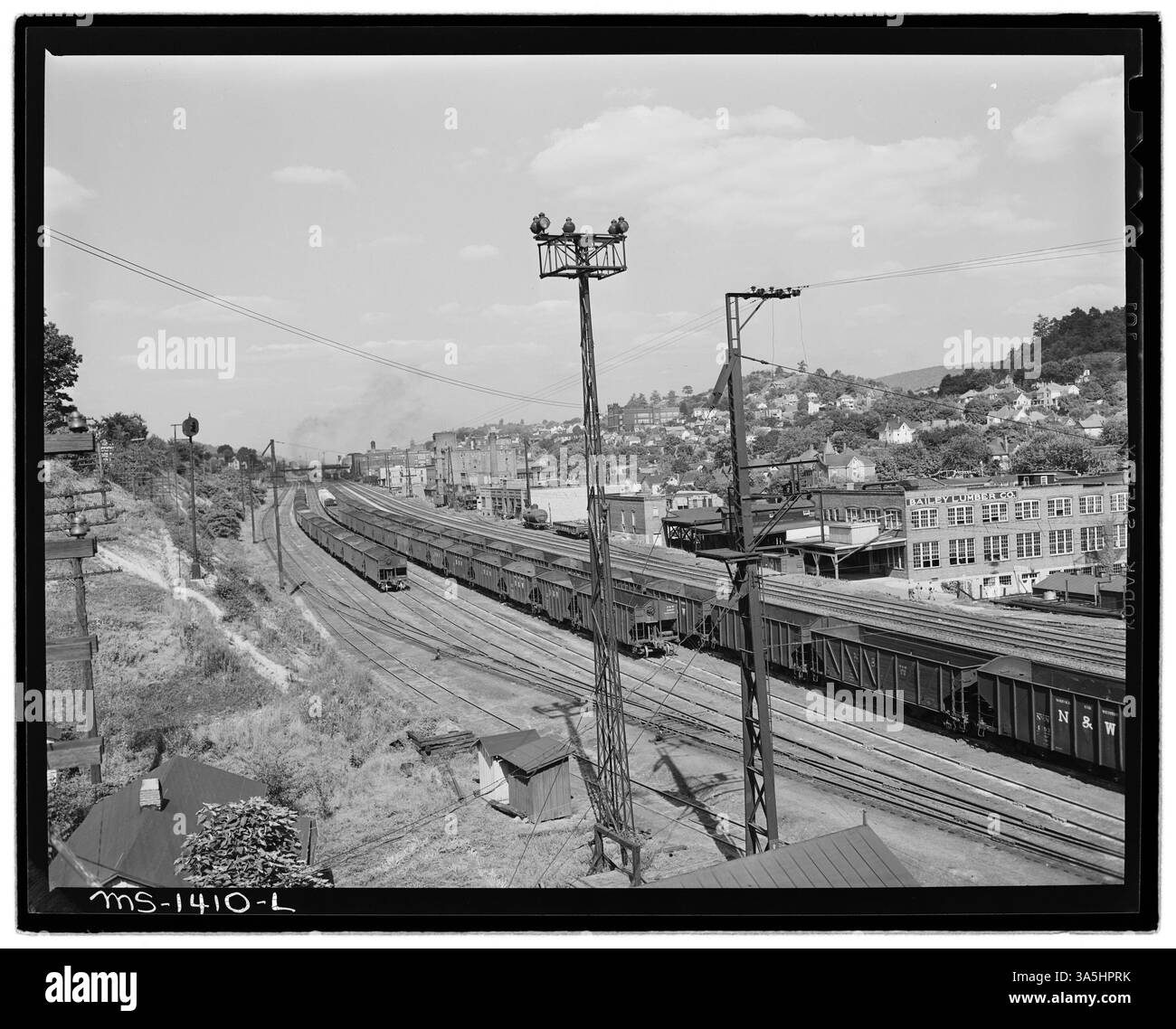 Empty coal cars sit in a yard along railroad tracks in Bluefield, West Virginia, ready for ...