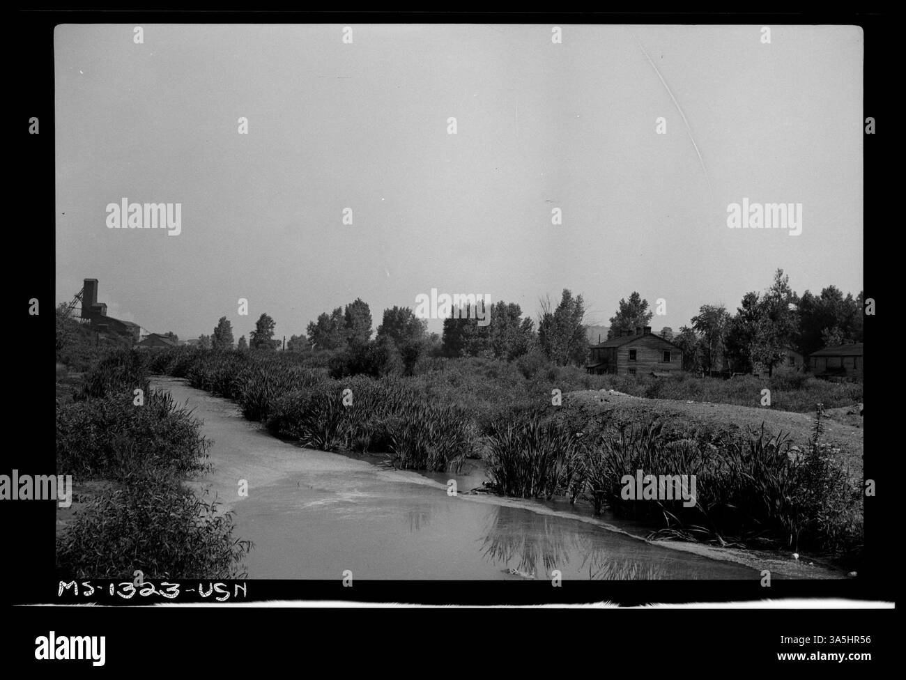 The mining town of Slovan, Pennsylvania, behind trees, serving as a ...