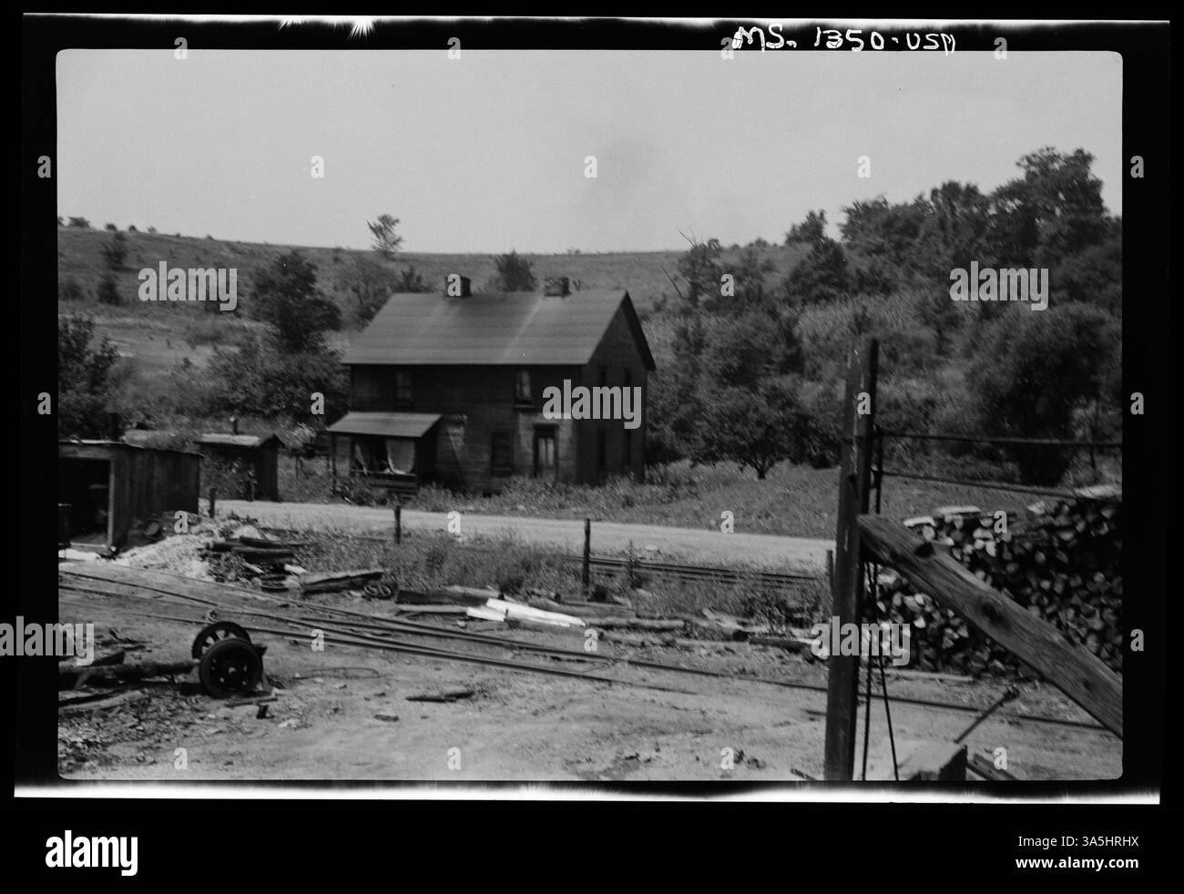 This 1946 photograph depicts a mining community, capturing the ...