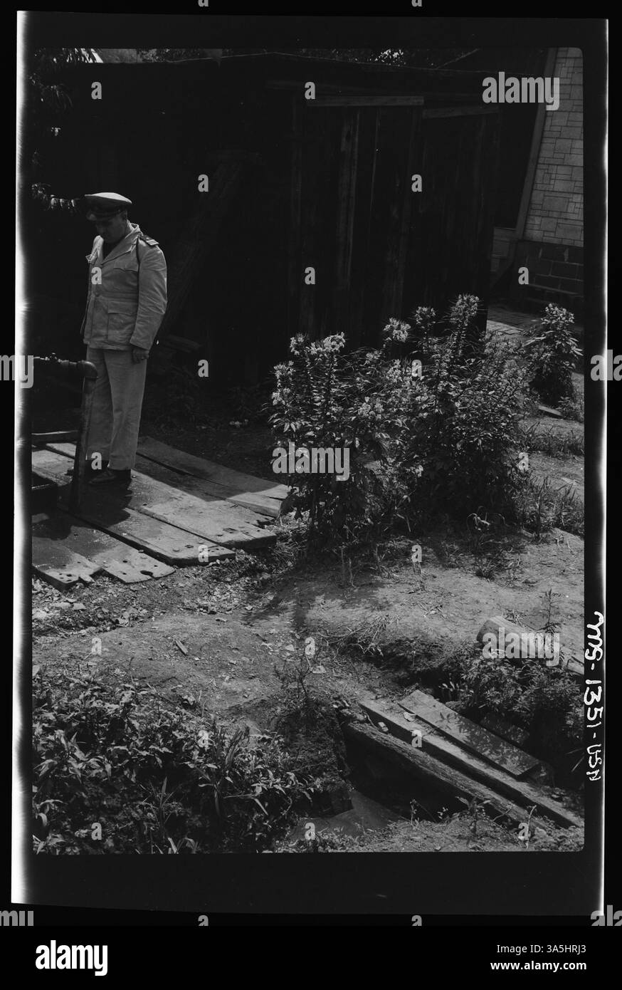 A photograph of a mining community, depicting the daily life and ...