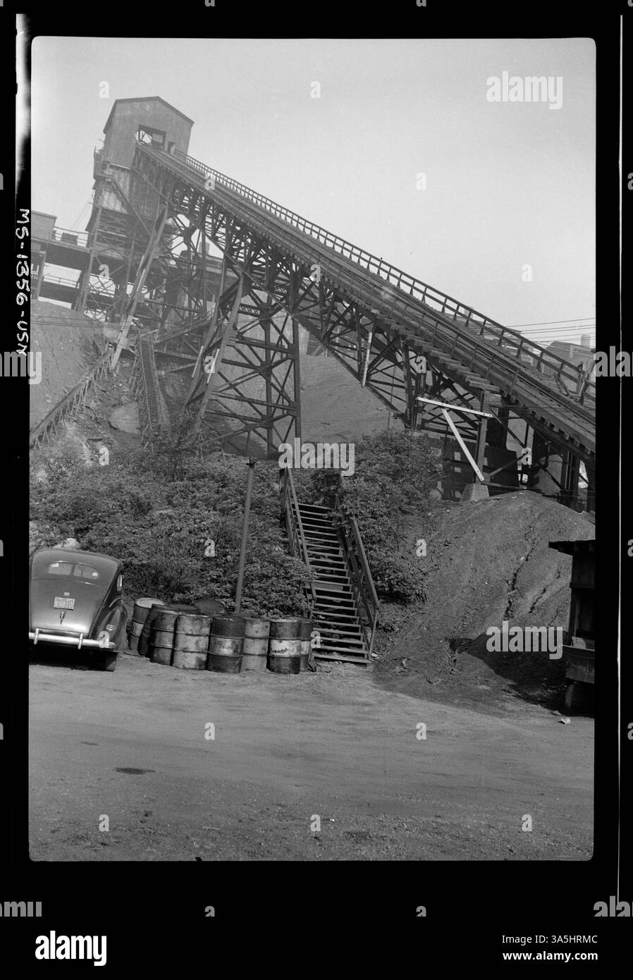 This 1946 image shows a belt conveyor system delivering coal from the ...
