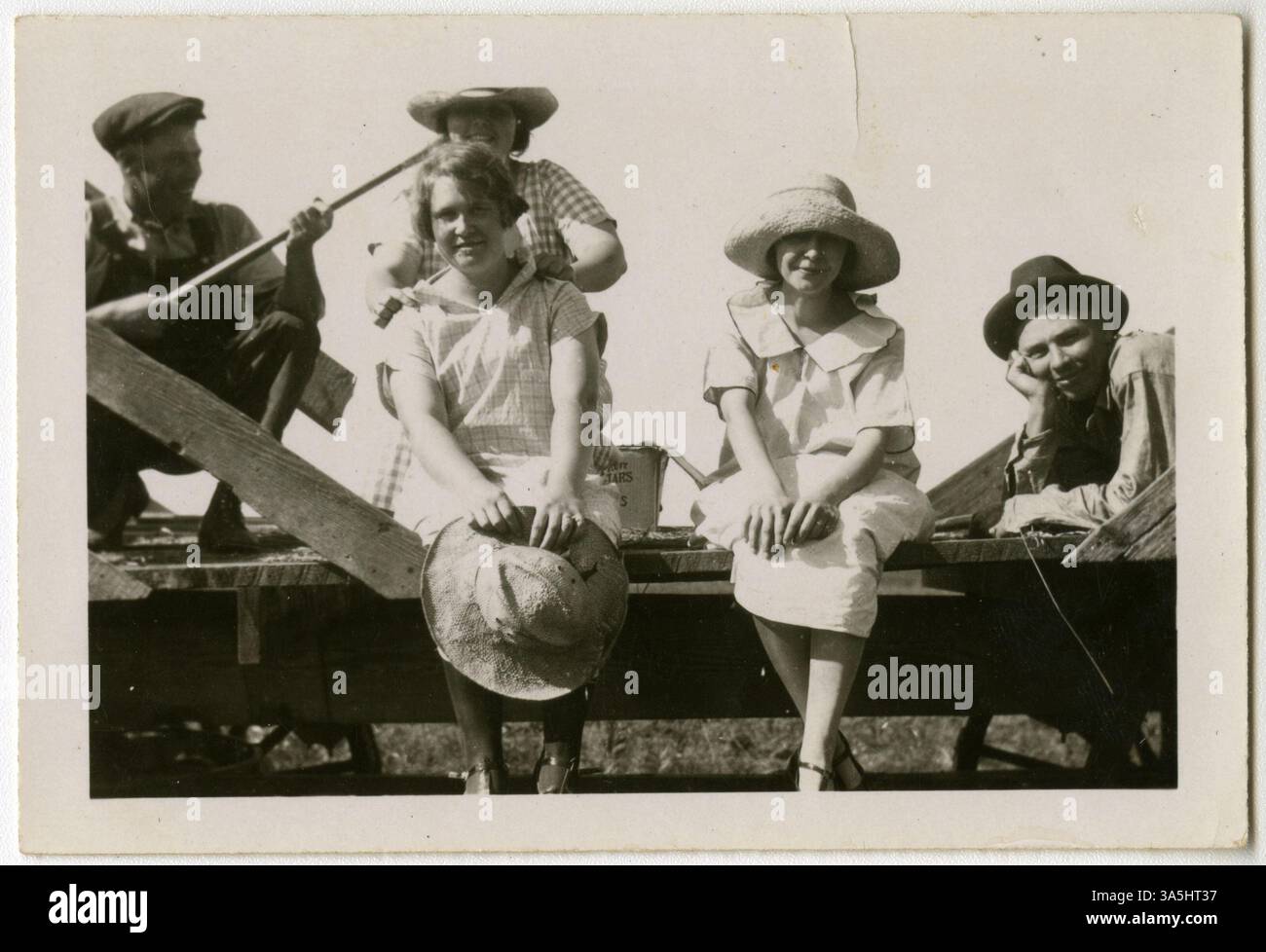 A group of people, including Margie Rognlie (second from the right), is ...