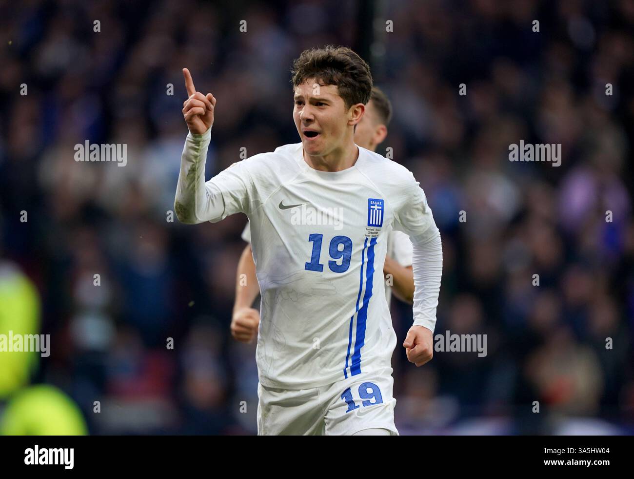 Greece's Konstantinos Karetsas celebrates scoring their side's second ...
