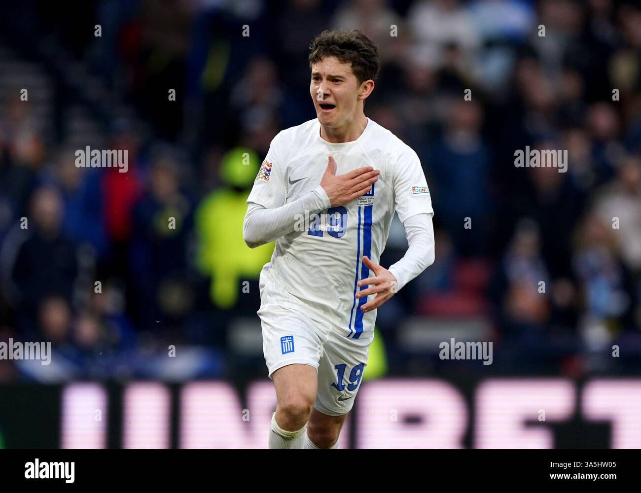 Greece's Konstantinos Karetsas celebrates scoring their side's second ...