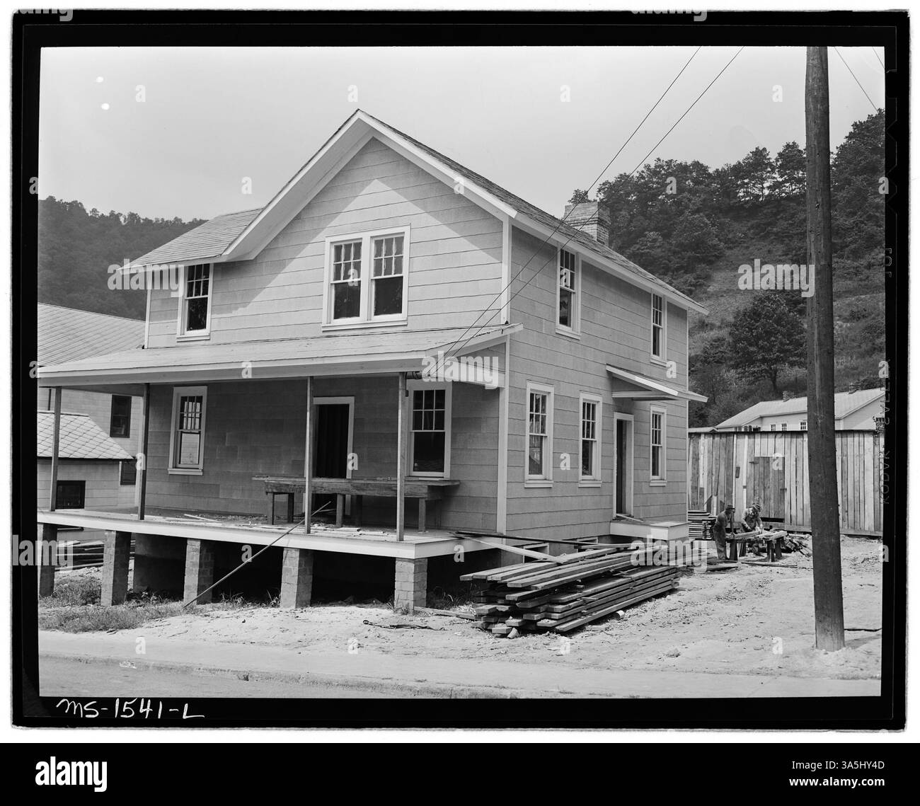 This 1946 photograph shows a house being repaired at U.S. Coal and Coke ...