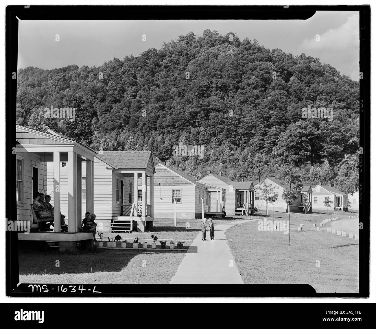 Houses for miners located along the main road of Koppers Coal Division ...