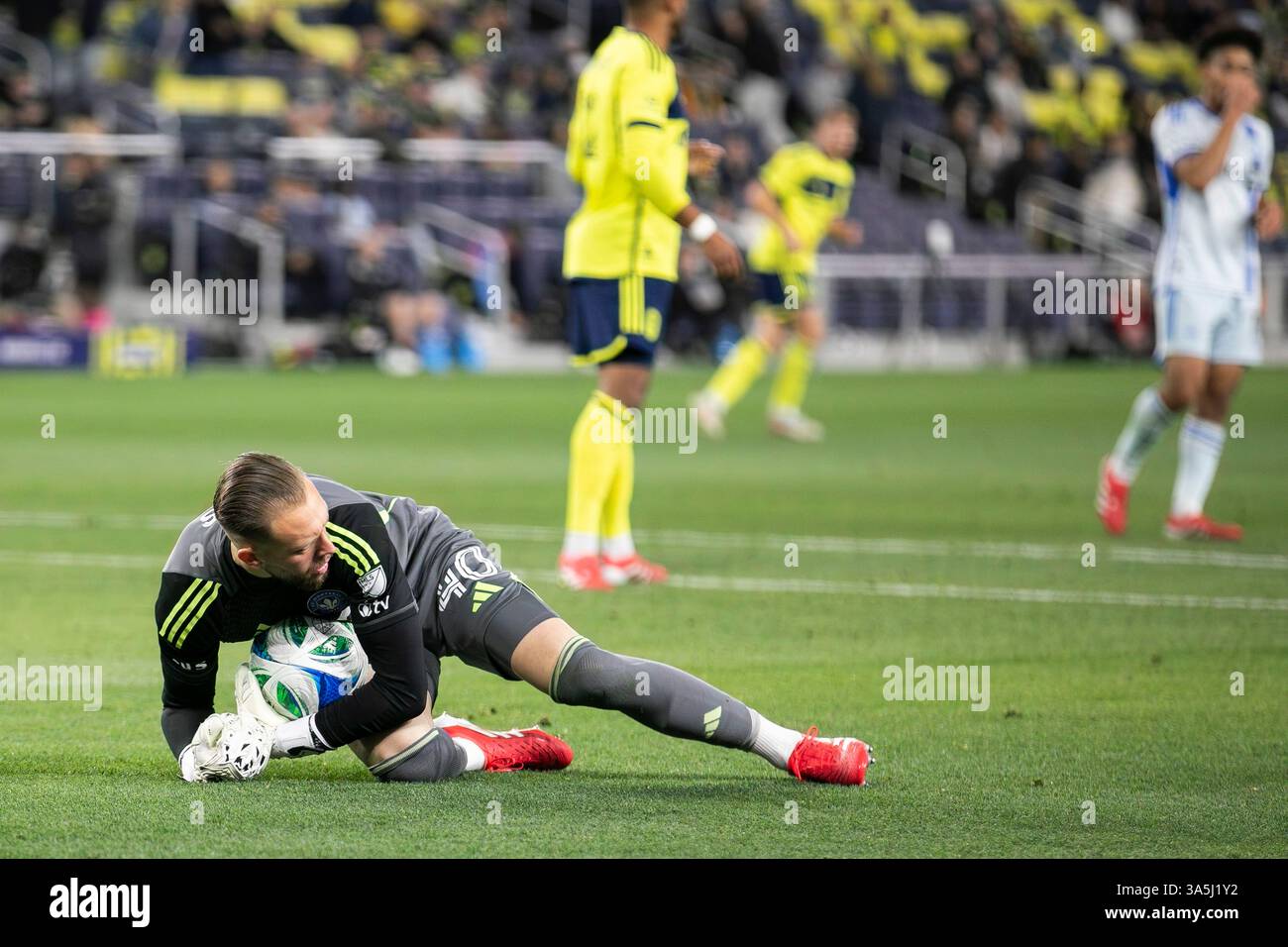 Nashville, USA. 22nd Mar, 2025. CF Montreal goalkeeper Jonathan Sirois ...