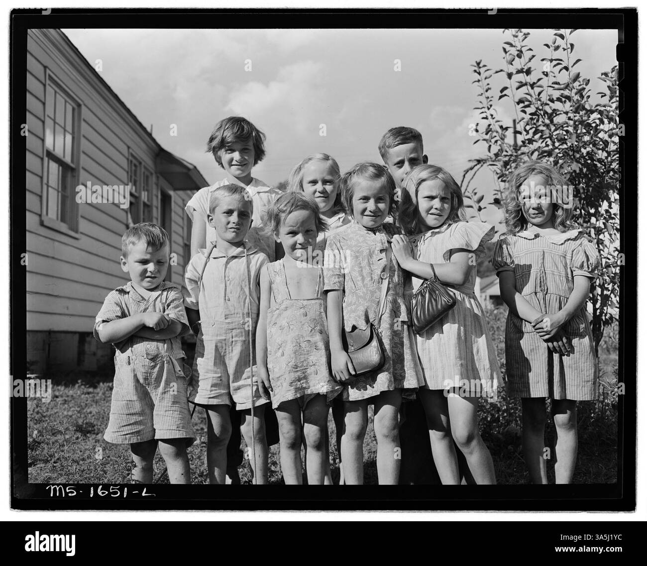 Children of miners are shown in this photo, capturing life in the ...