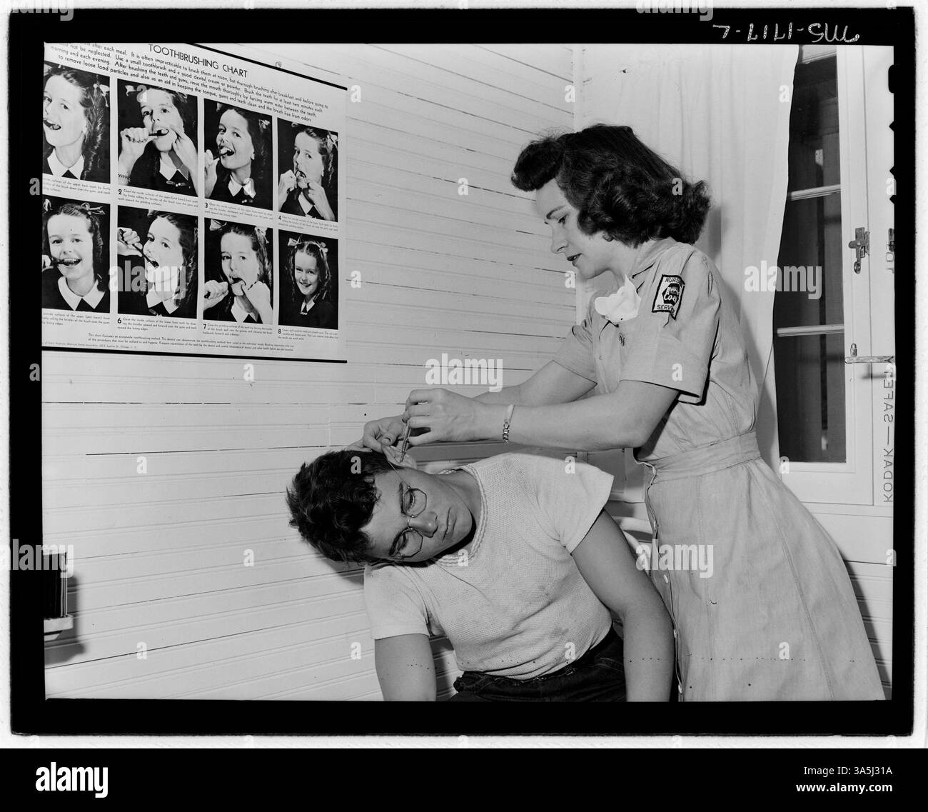 At Camp Thomas E. Lightfoot in Hinton, West Virginia, Hilda Snyder, a registered nurse, treats a ...