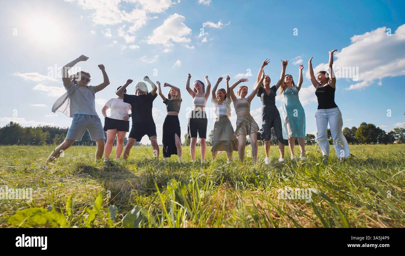Happy high school students celebrating summer vacation by jumping ...