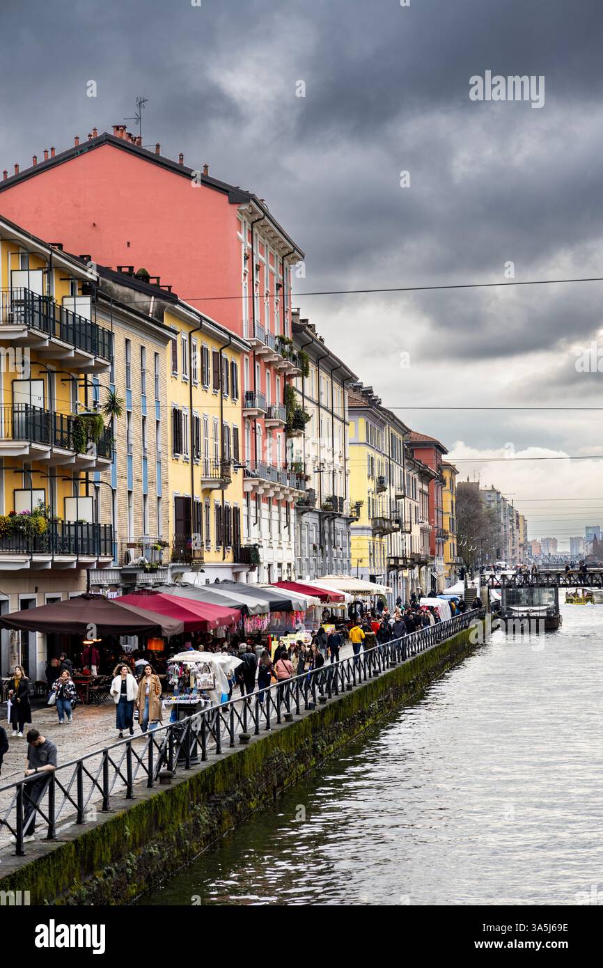 Colourful buildings and restauarnts along Naviglio Grande canal ...