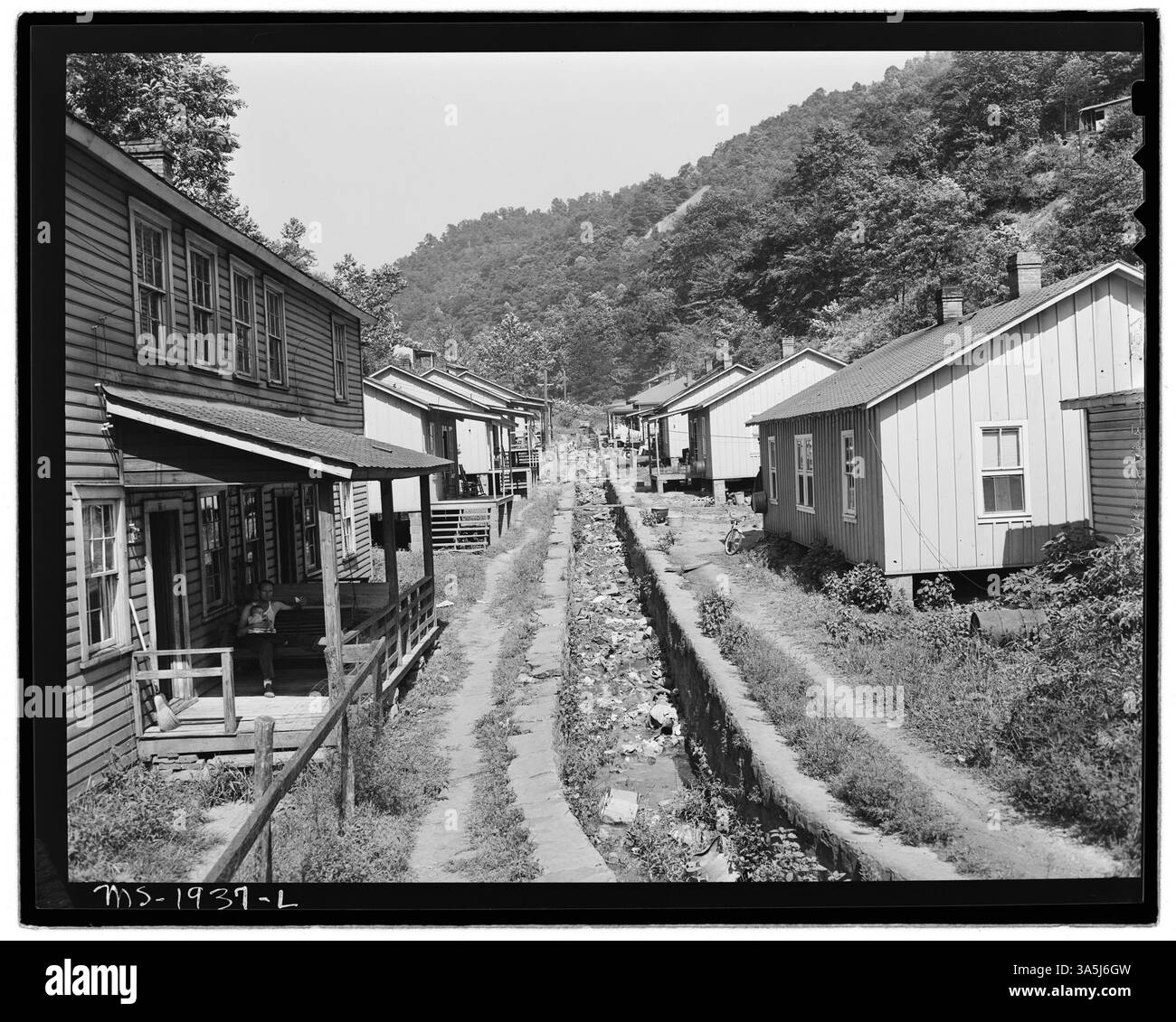 This image shows a double row of houses at Panther Red Ash Coal Corp.'s ...