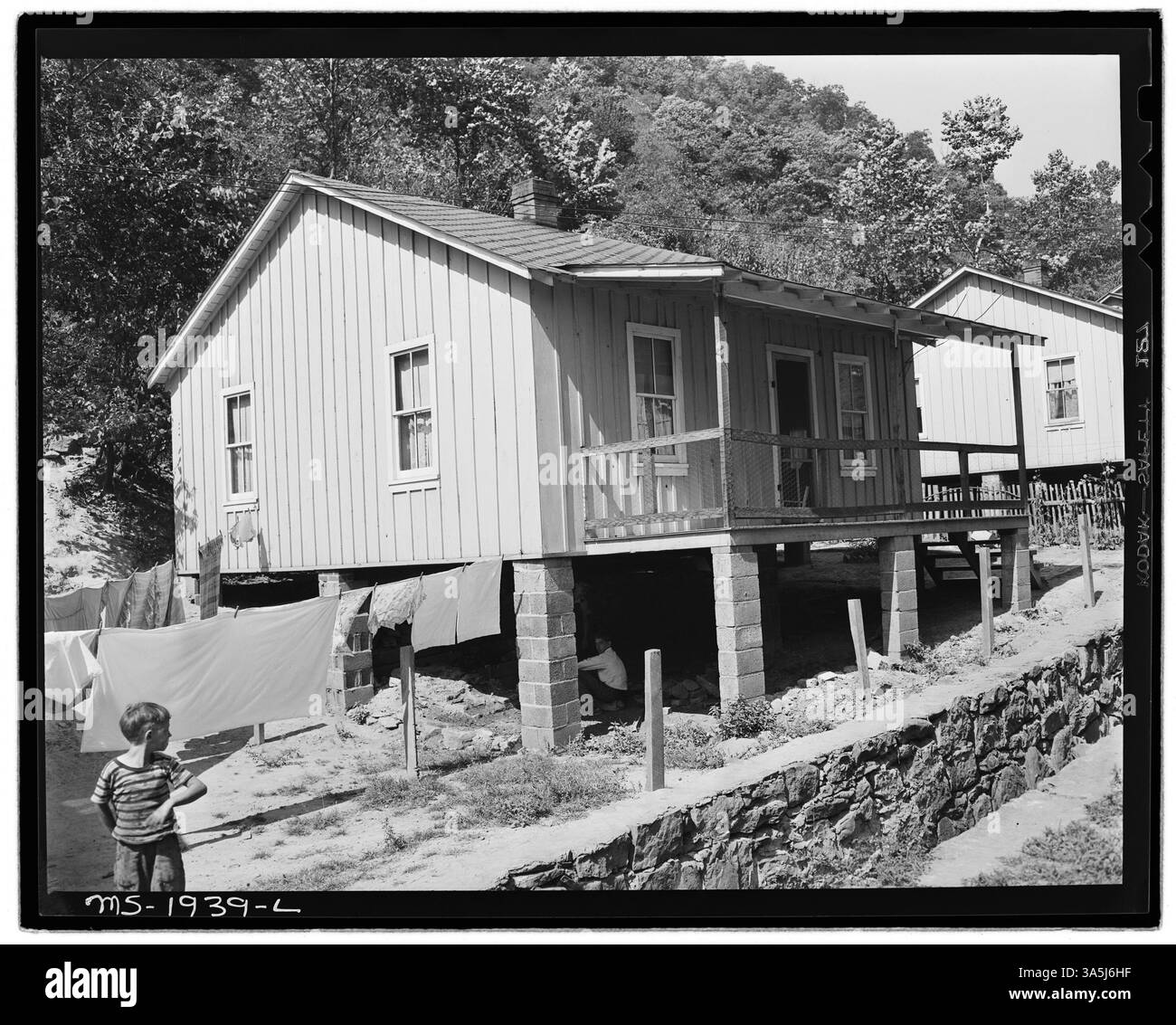 A new house built by Panther Red Ash Coal Corporation for workers at ...