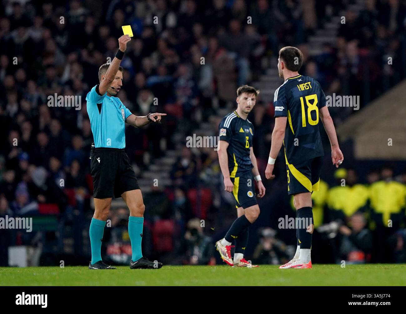 Scotland's George Hirst is booked during the UEFA Nations League play ...
