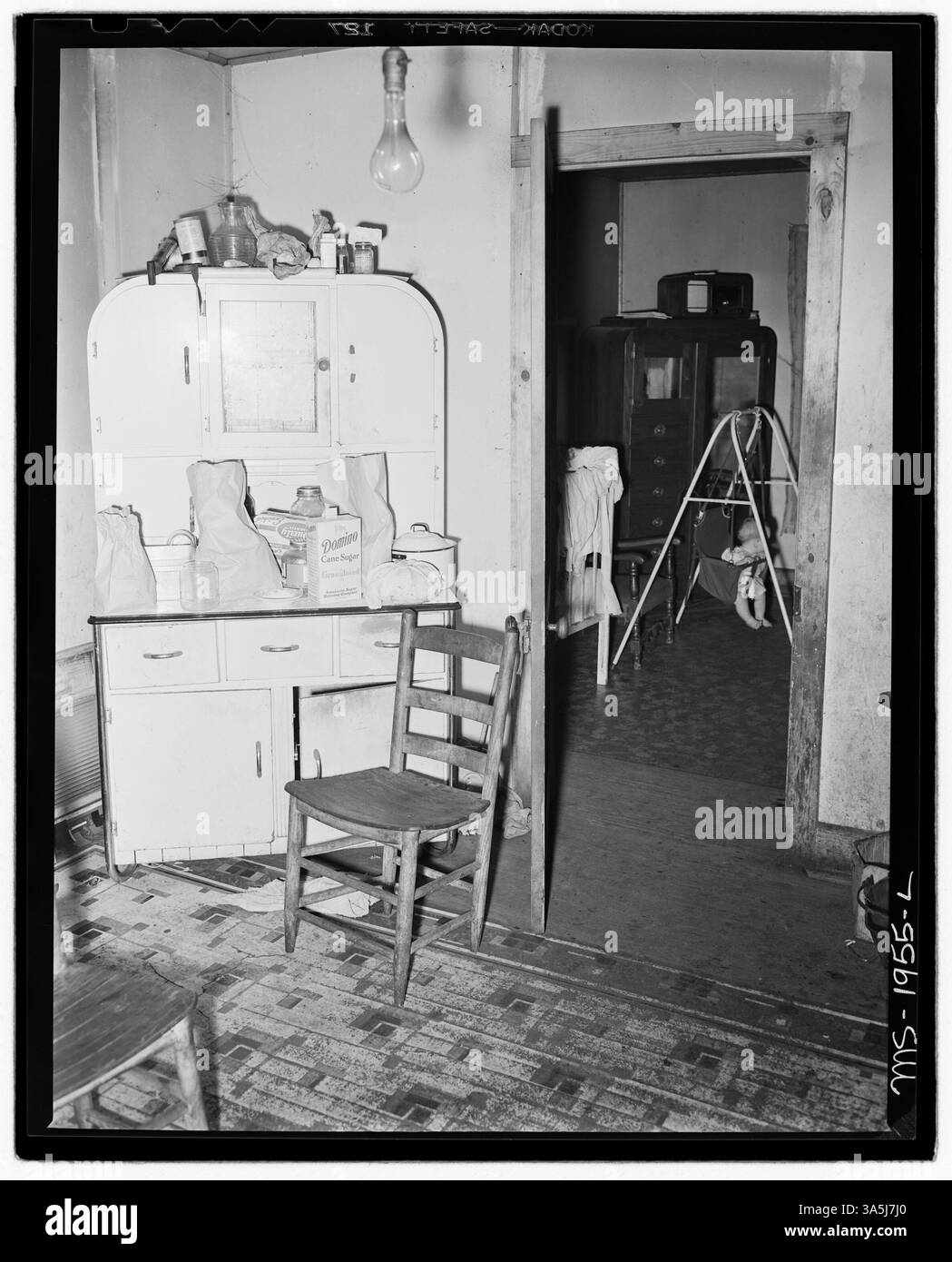 The kitchen in the four-room house of the Philip Asbury family at the ...