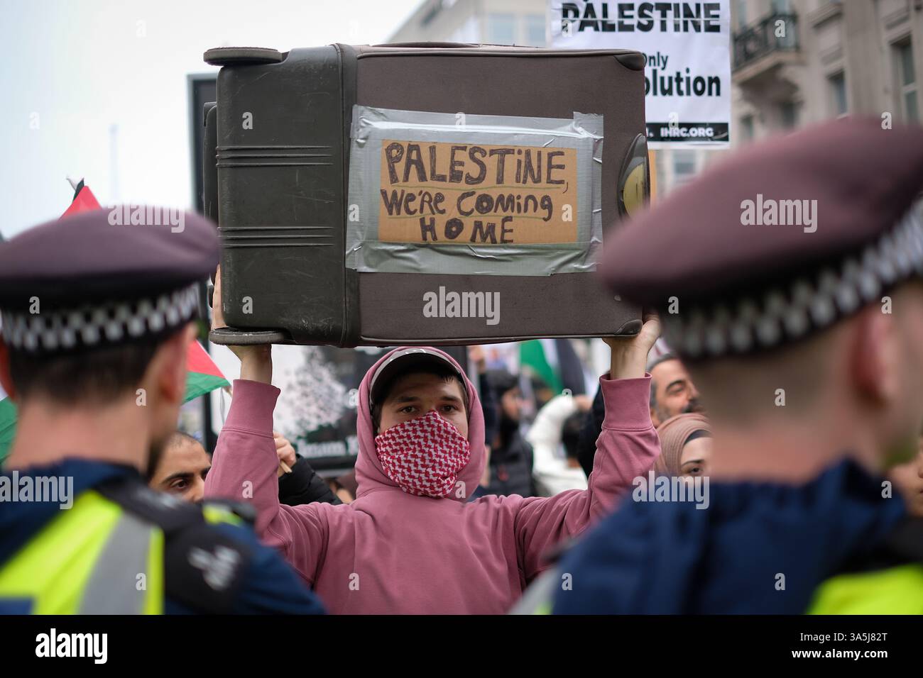 London, UK. 23rd March 2025. Protesters march through Central London ...