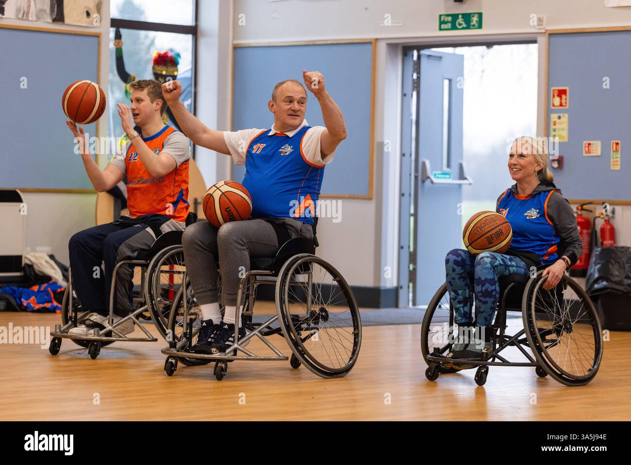Knaresborough, UK. 23 MAR, 2025. Staffer Isaac, Ed Davey and Roz Savage ...