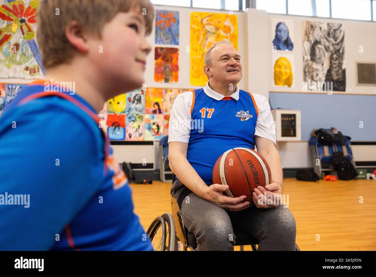 Knaresborough, UK. 23 MAR, 2025. Ed Davey with team member Ben as the ...
