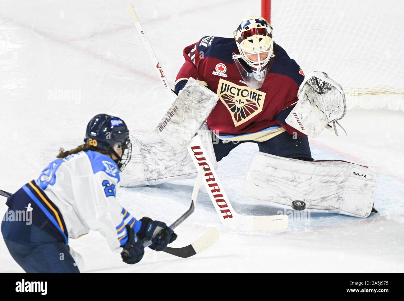 Laval, Canada. 23rd Mar, 2025. Montreal Victoire goaltender Elaine ...
