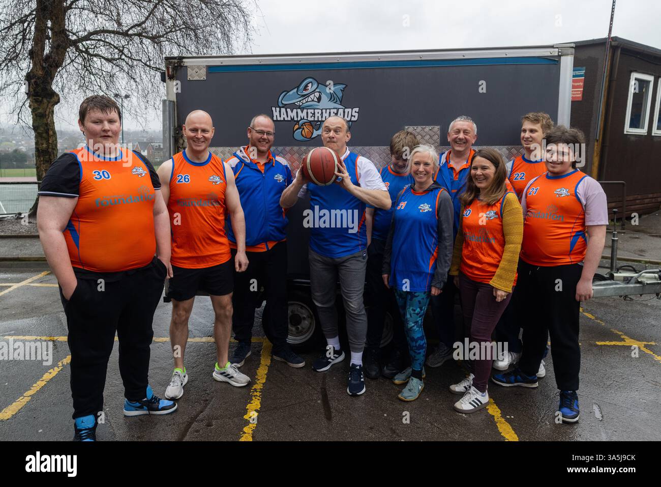 Knaresborough, UK. 23 MAR, 2025. Ed Davey poses for a picture with team ...