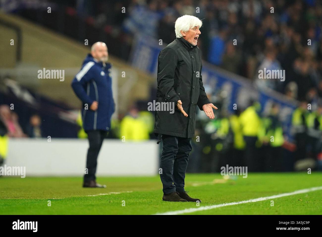 Greece head coach Ivan Jovanovic (right) reacts as Scotland head coach ...