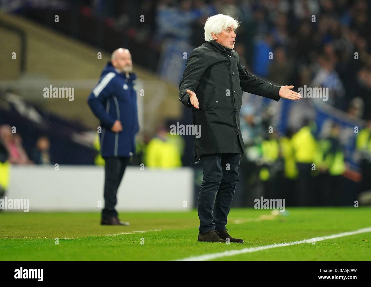 Greece head coach Ivan Jovanovic (right) reacts as Scotland head coach ...
