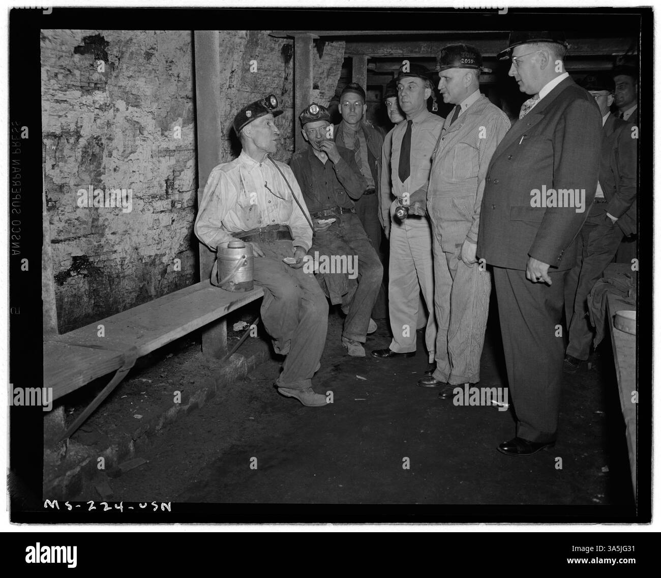 Rear Admiral Joel T. Boone and Commodore Charles T. Dickeman speak with ...