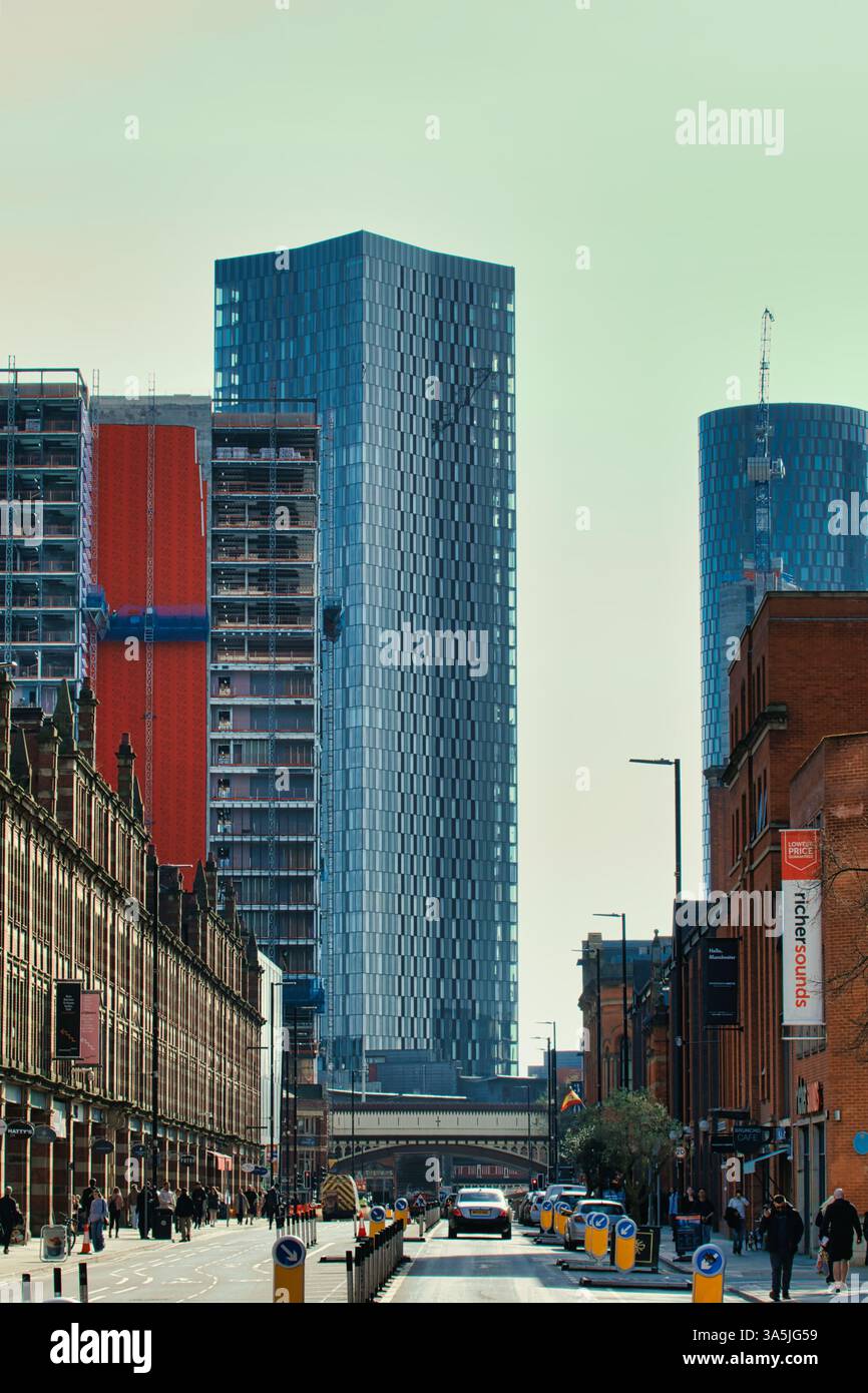 Street view of city buildings and pedestrians, with focus on modern ...