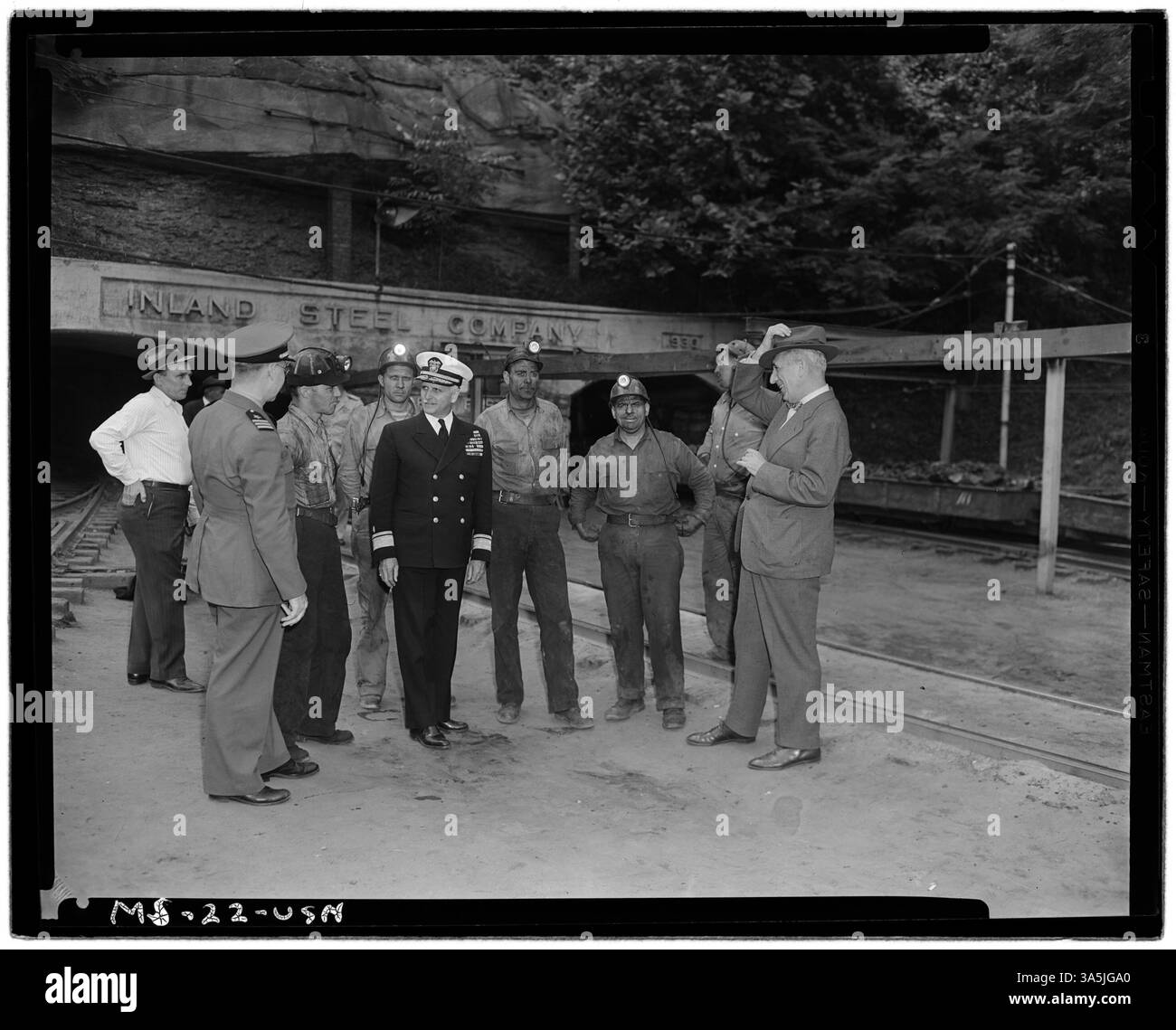 An official group at the entry of Inland Steel Company’s mine in ...