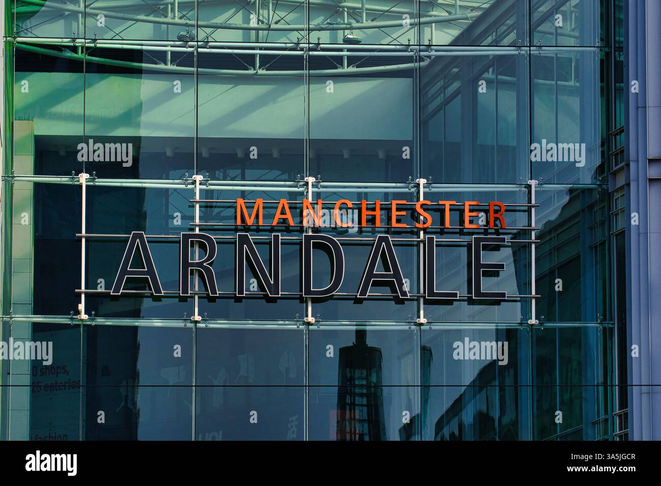 Exterior shot of Manchester Arndale shopping center featuring glass ...